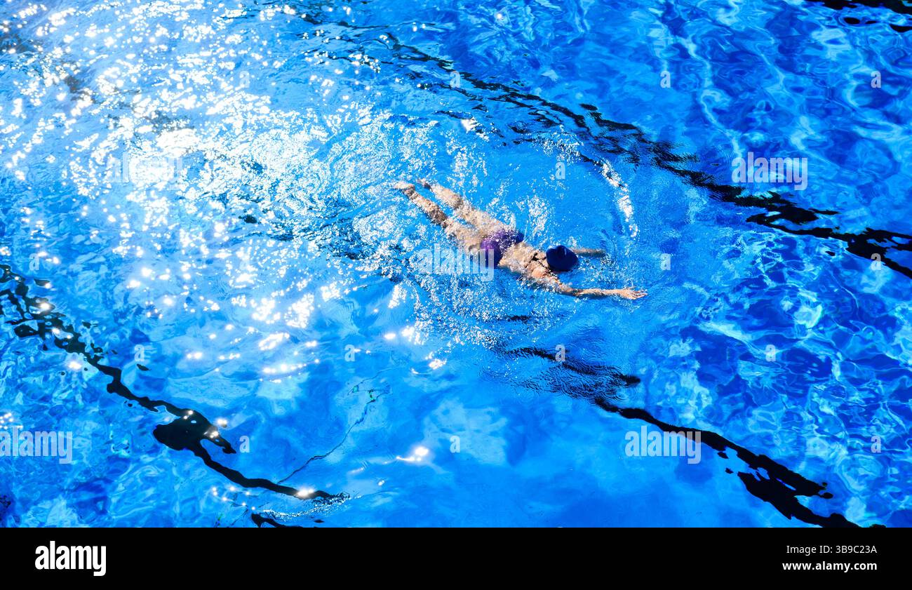 09 May 2025, Lower Saxony, Hanover: A woman swims in the Annabad ...