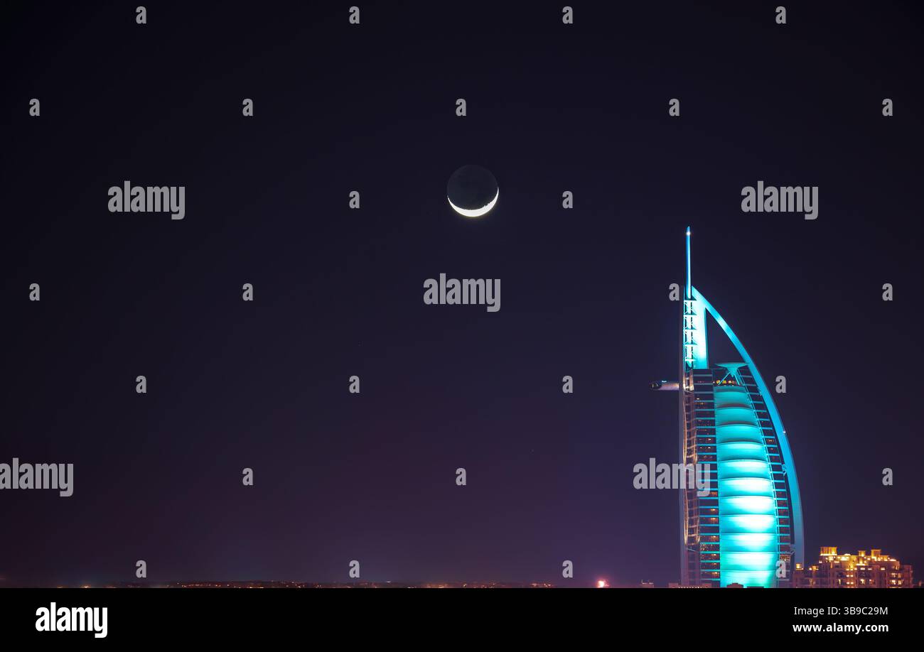 A stunning night-time view of the iconic Burj Al Arab hotel in Dubai ...