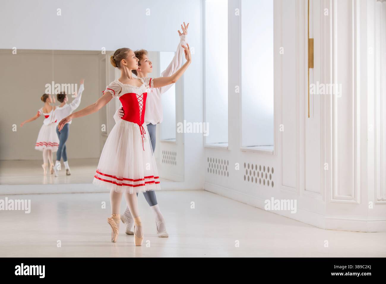Ballet Duo Dancing Gracefully in Elegant Dance Studio Stock Photo - Alamy