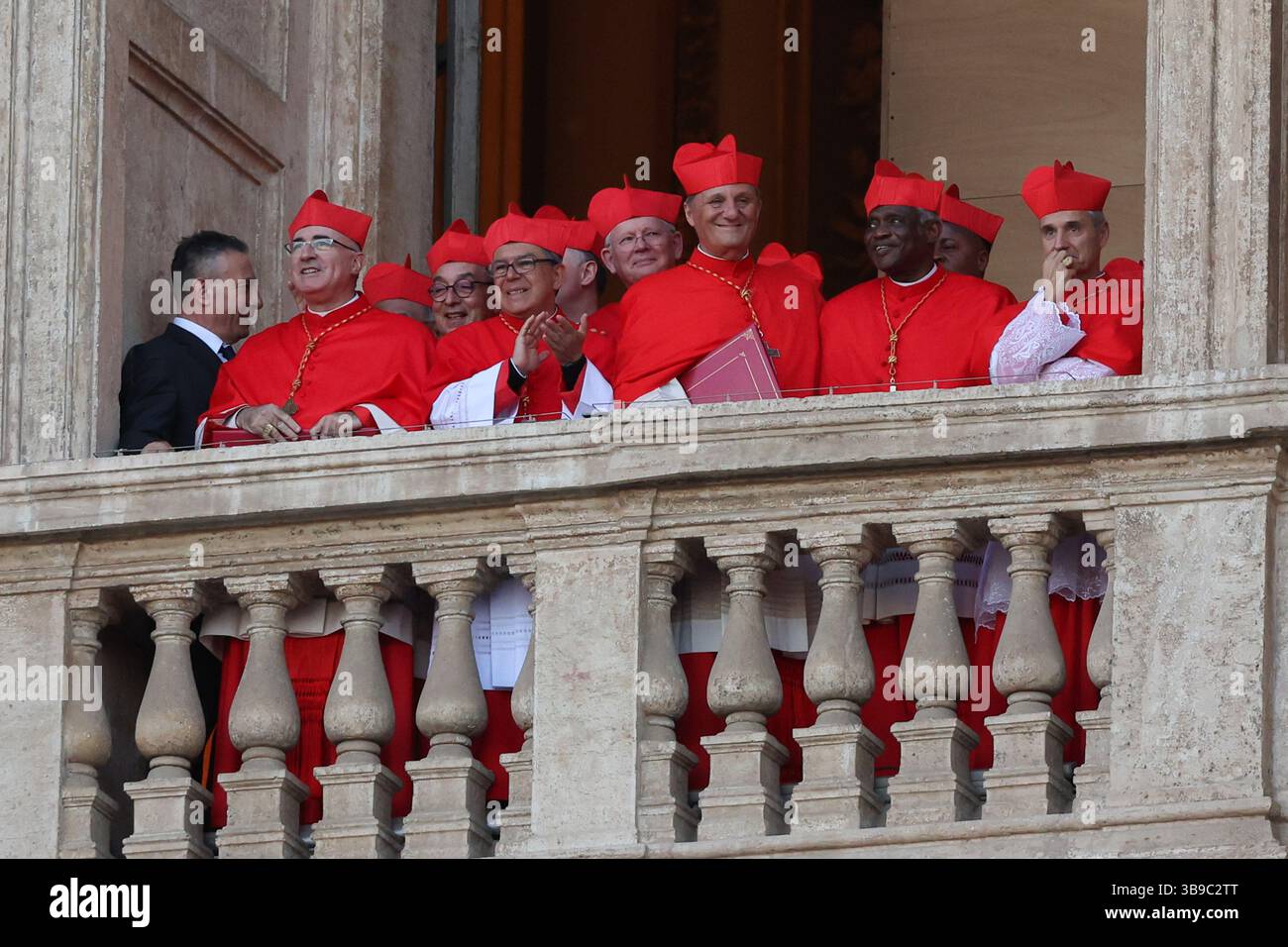 Rome, Italy. 08th May, 2025. Cardinals stand on the side balcony of St ...