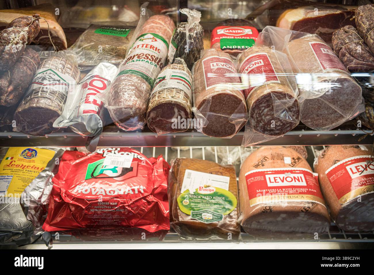 Cured lunch meats in a deli display Stock Photo - Alamy