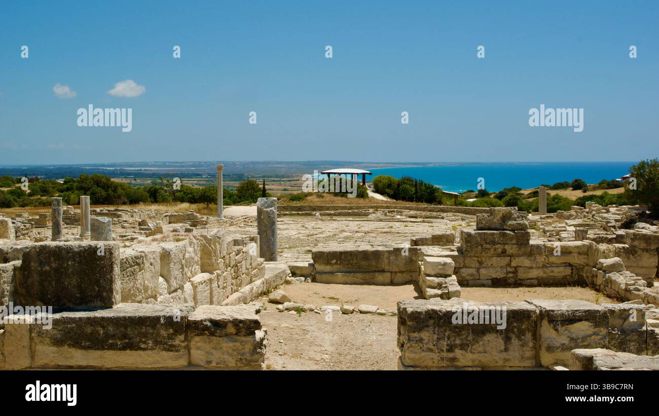 Ancient ruins featuring stone columns and walls with a stunning view of ...