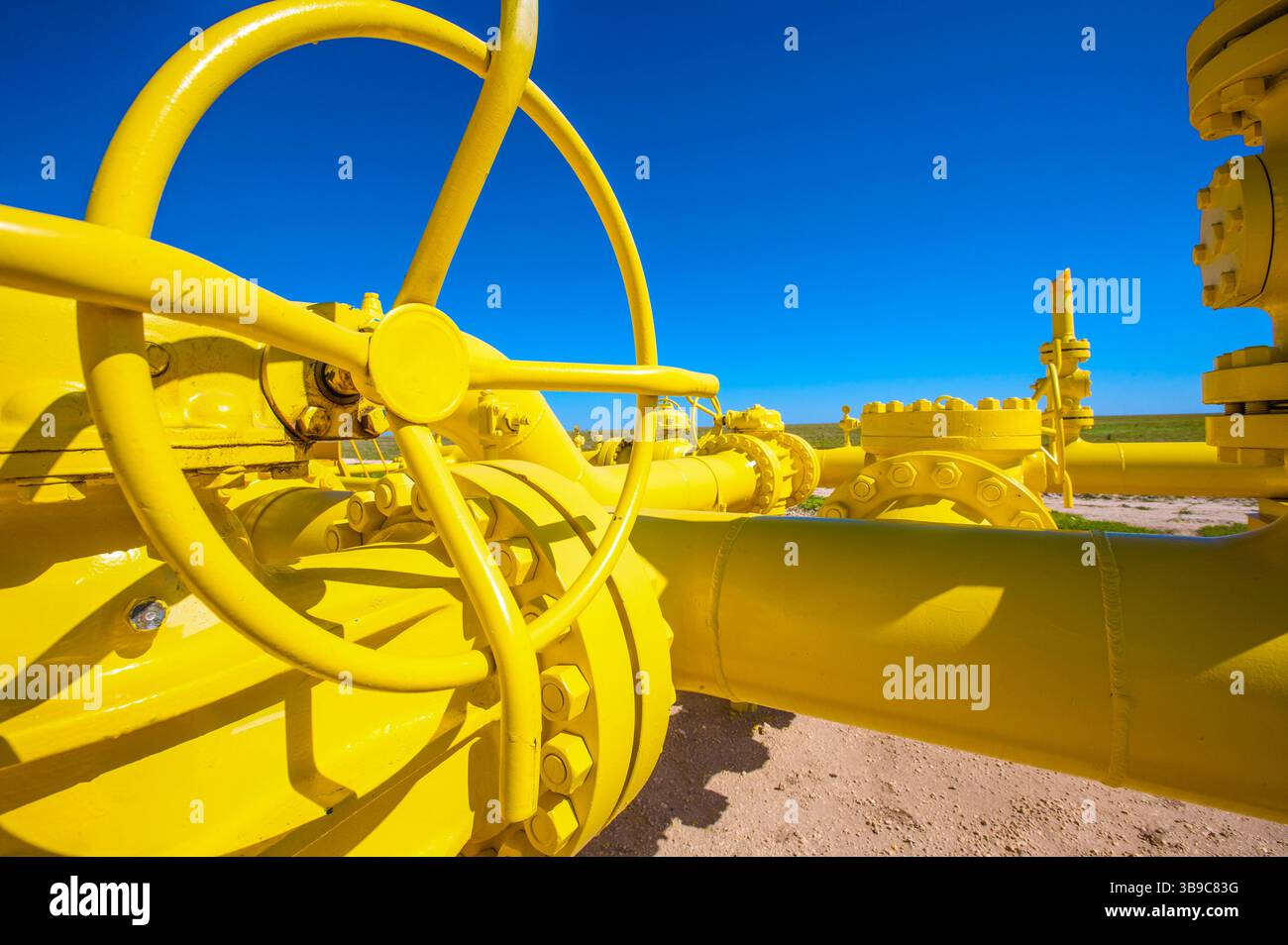 Oilfield operator makes his rounds Stock Photo - Alamy