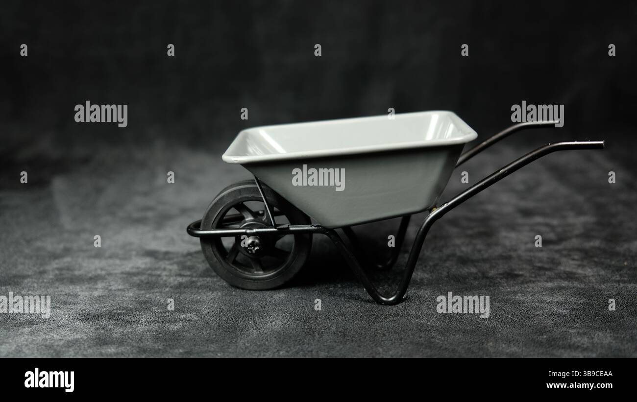 Decorative construction cart with industrial design Stock Photo - Alamy