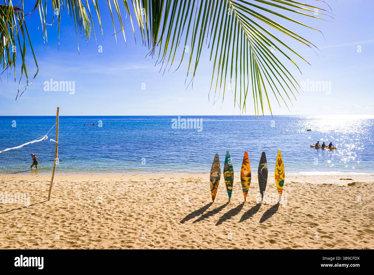 Tropical beach with white sand on a sunny day. Binucot Beach, Ferrol ...