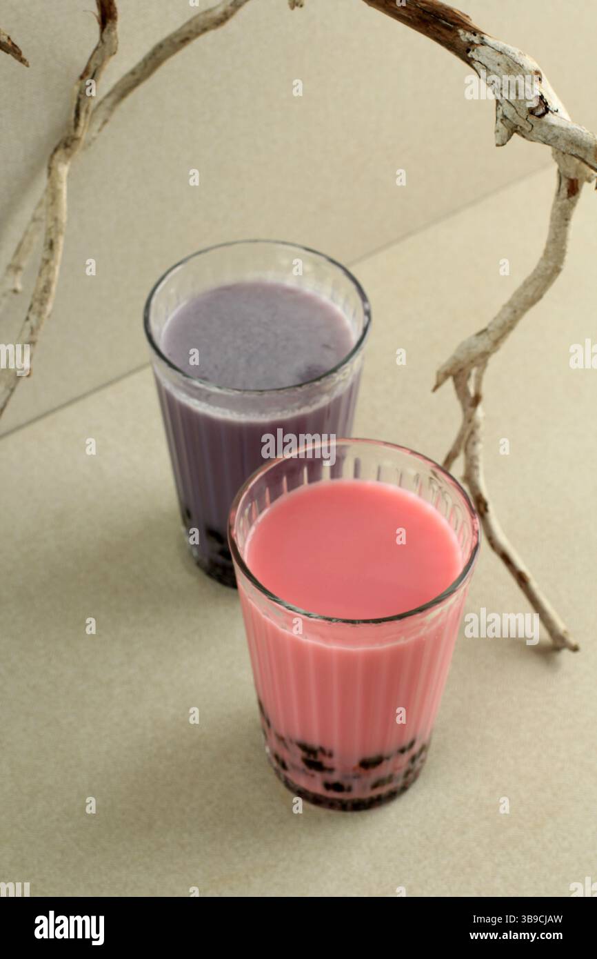 Pink and Purple Boba Pearl Bubble Milk Tea on Tall Glass, Popular Drink ...