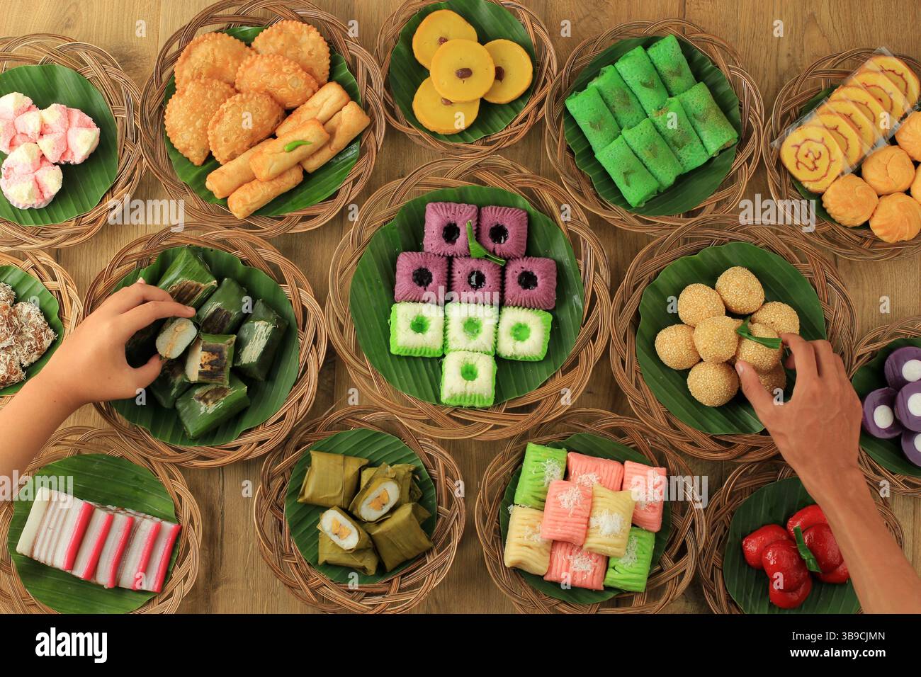 Jajan Pasar Festive Various Colorful Jajan Pasar, Traditional Indonesian Snack. Hands in Frame ...