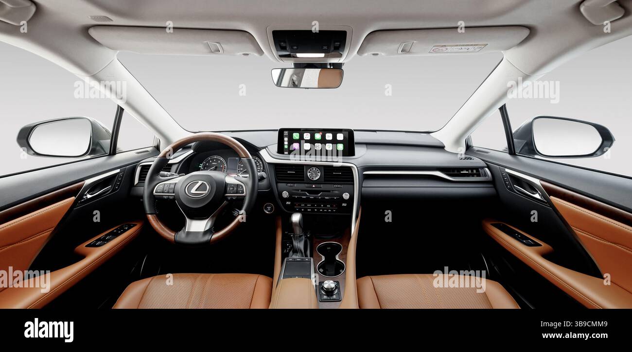 Lexus RX interior with tan leather. Car front panel wide angle view ...