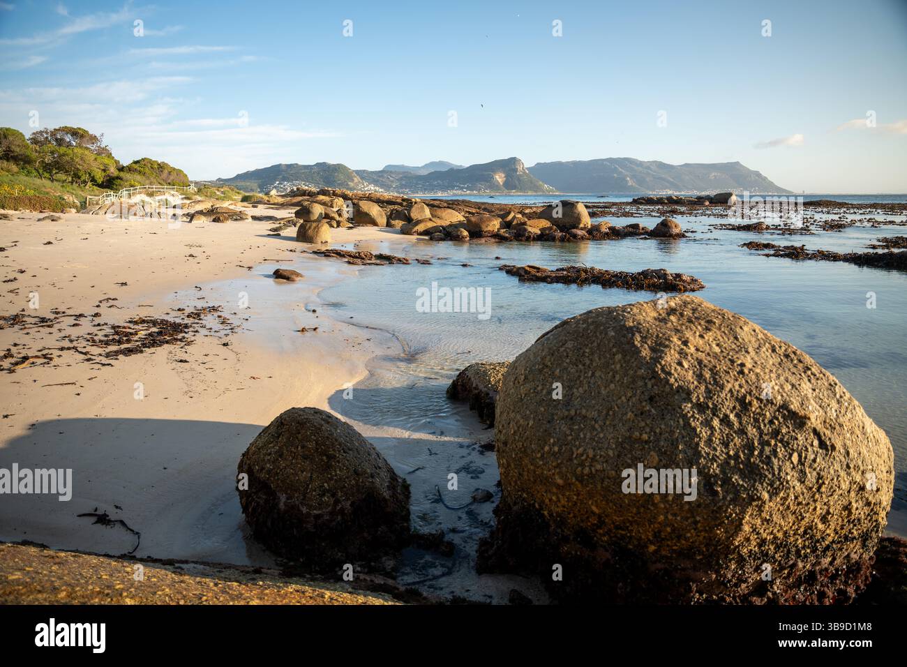 A scenic view of Boulders Beach in Cape Town, South Africa, featuring ...