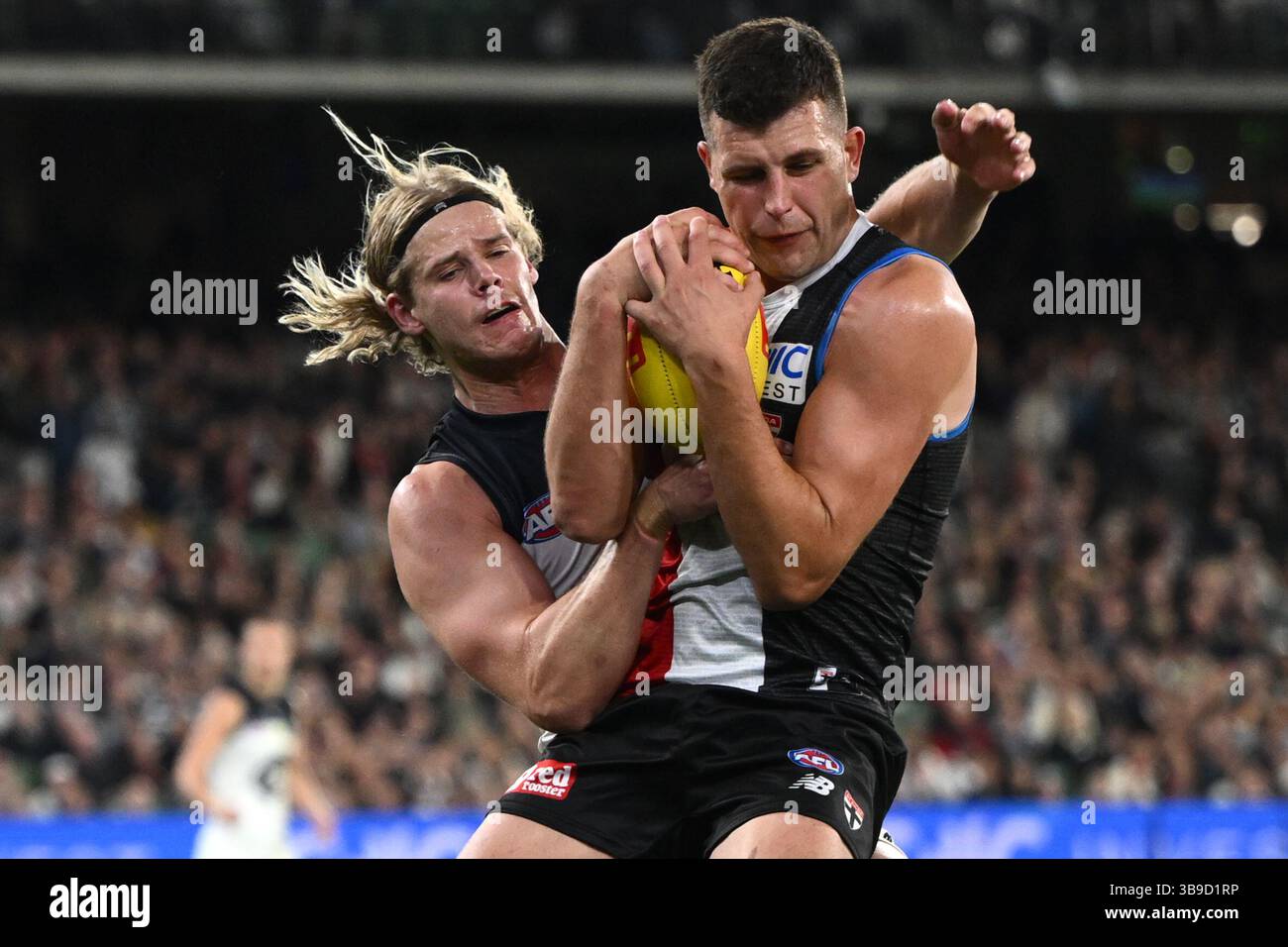 Melbourne, Australia. 09th May, 2025. Tom de Koning of Carlton tackles Rowan Marshall of St ...
