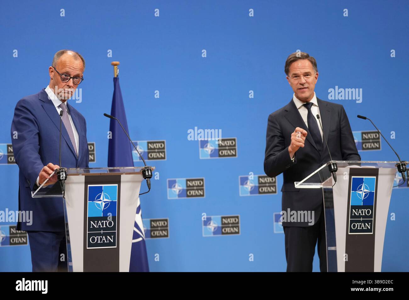 Germany's Chancellor Friedrich Merz, left, and NATO Secretary General ...