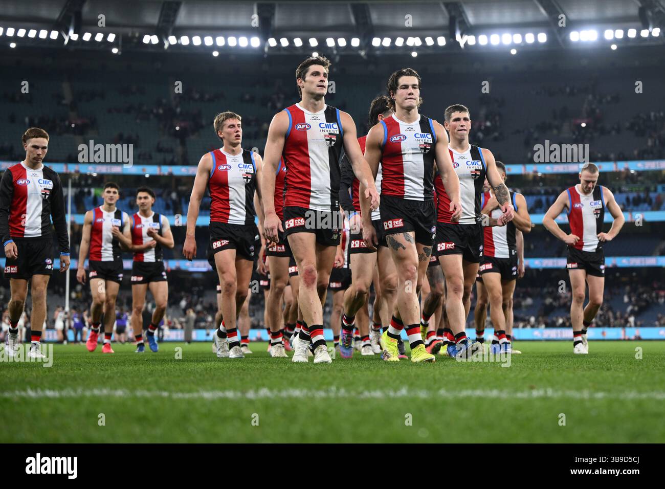 Melbourne, Australia. 09th May, 2025. St Kilda players leave the field following the AFL Round 9 ...