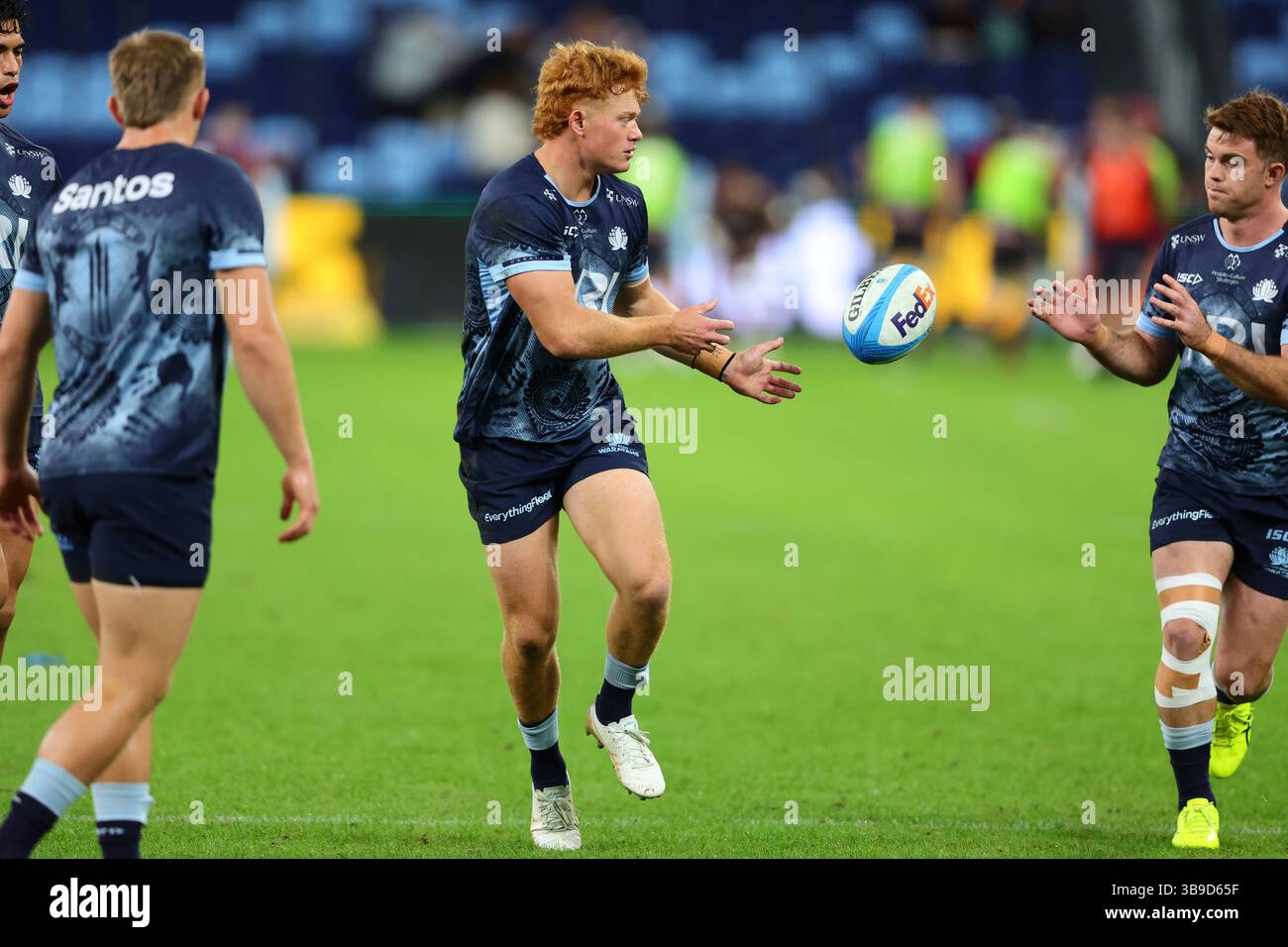 SYDNEY, AUSTRALIA - MAY 09: Tane Edmed of the Waratahs warms up before ...