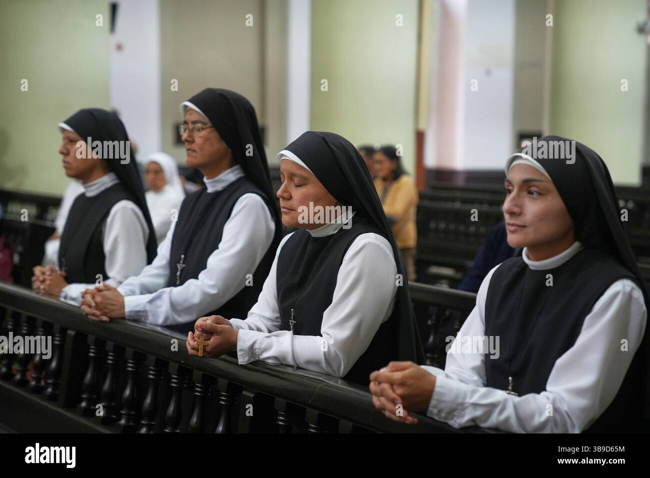 Nuns pray during morning Mass at the Santa Maria Cathedral, the ...