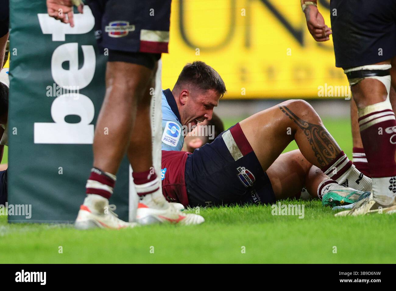 SYDNEY, AUSTRALIA - MAY 09: Jake Gordon of the Waratahs scores a try ...