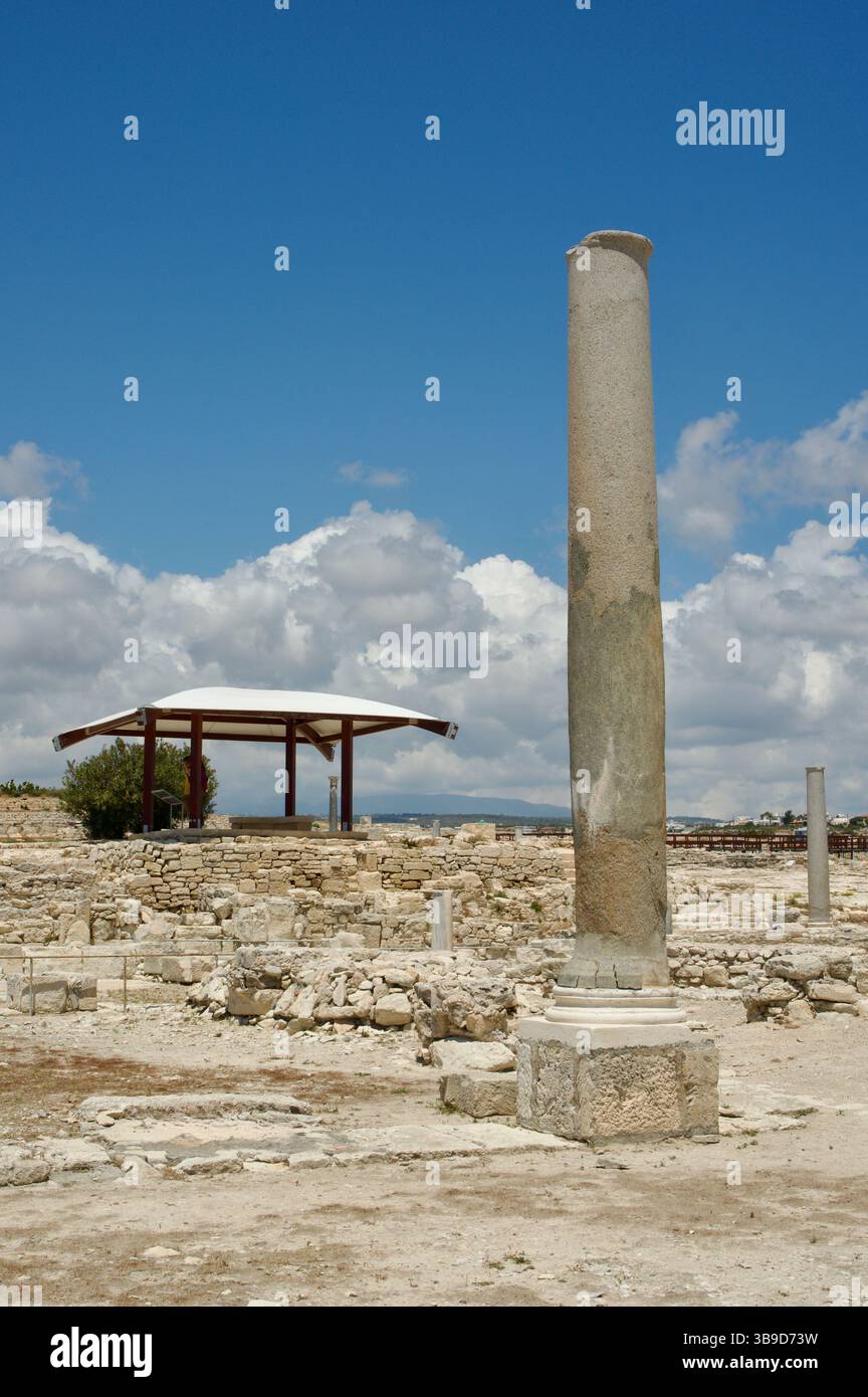 Explore weathered ruins featuring a stone column and a gazebo structure ...