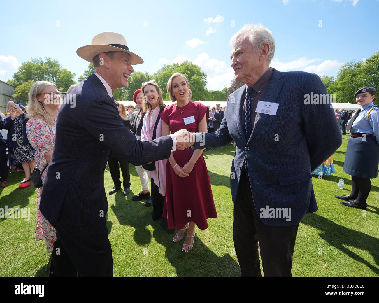 The Duke of Edinburgh meeting guests, including actor Larry Lamb (right ...