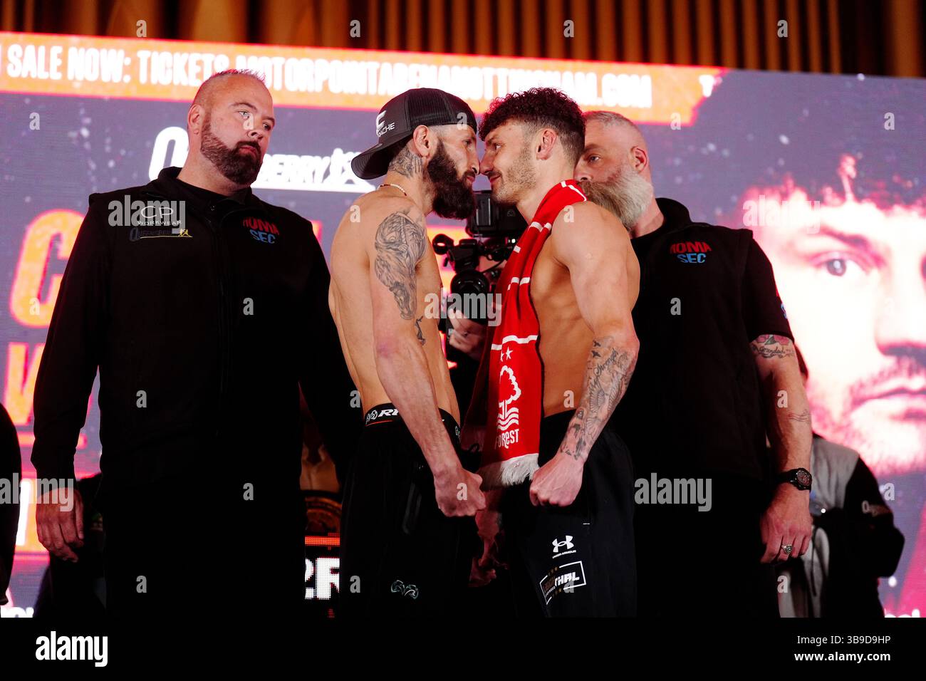 Anthony Cacace (left) and Leigh Wood face off during the weigh in at ...