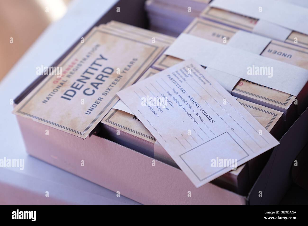 Identity cards viewed by The Princess Royal during a visit to St Peter ...