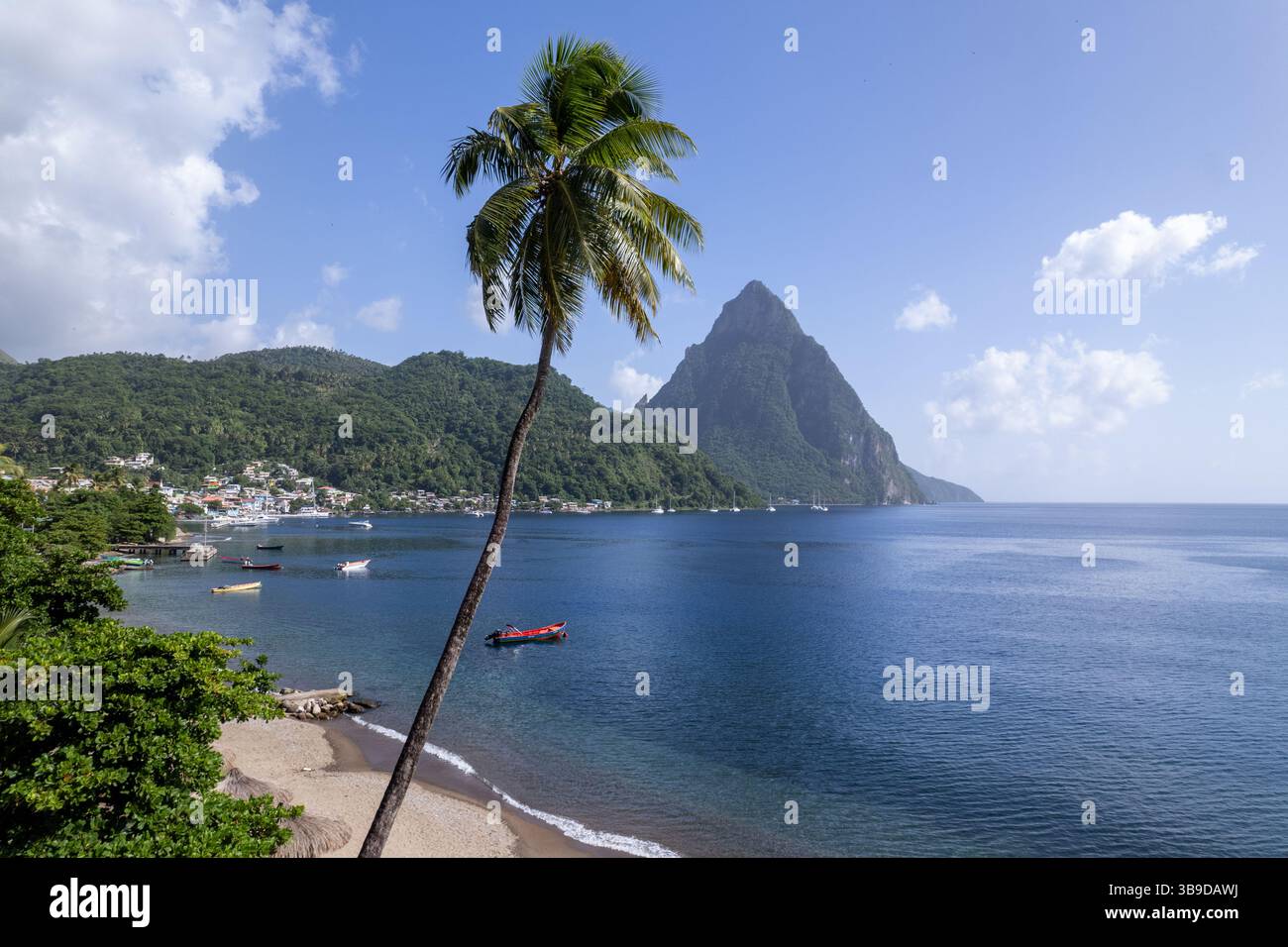 Aerial of boat in Soufriere Bay with Gros Piton and Petit Piton on St ...