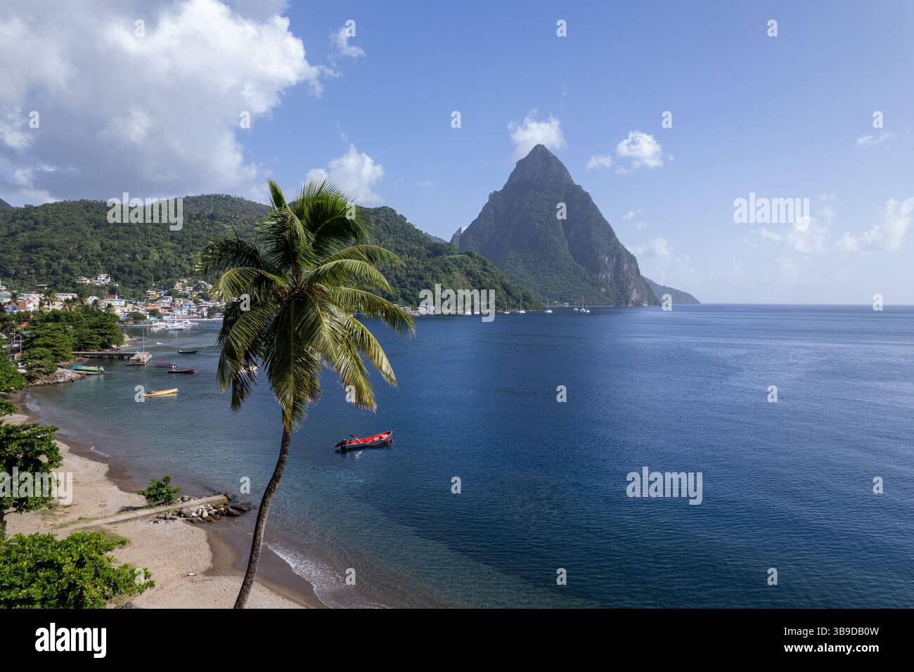 Aerial of boat in Soufriere Bay with Gros Piton and Petit Piton on St ...