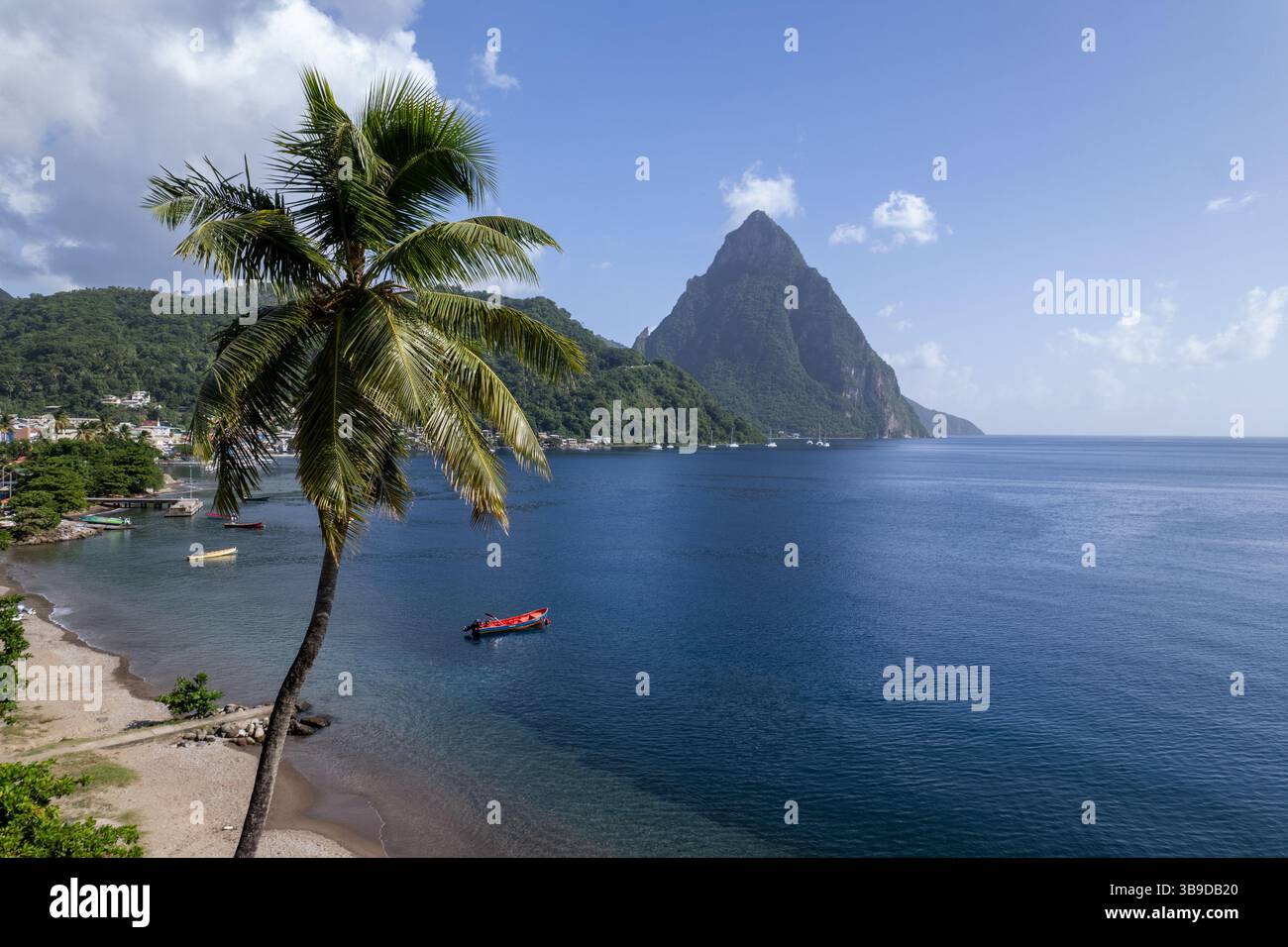 Aerial of boat in Soufriere Bay with Gros Piton and Petit Piton on St ...