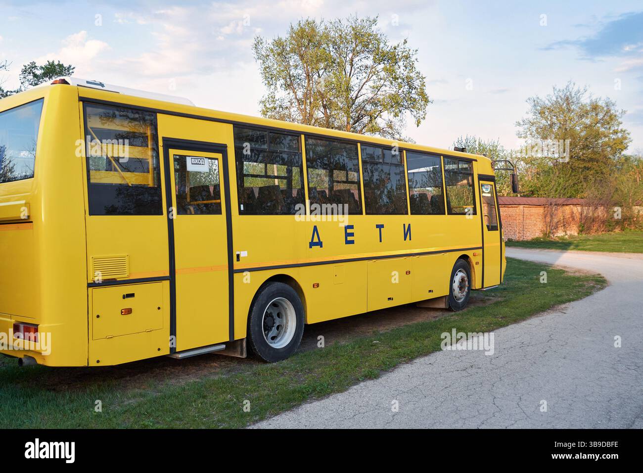 Yellow school bus with the inscription Children in Russian Stock Photo ...