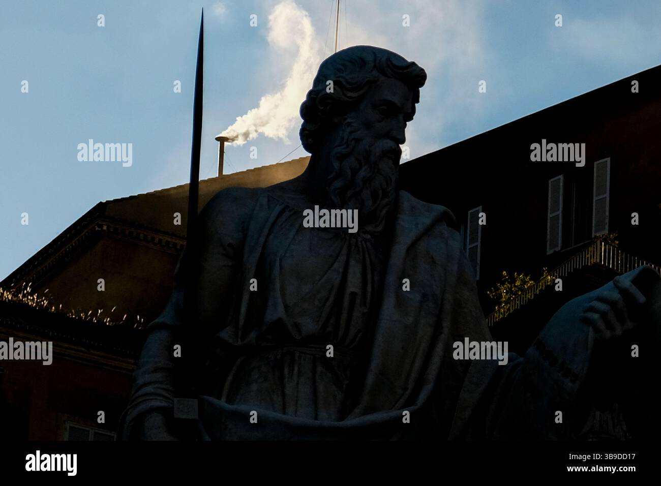 The white smoke rising from the chimney on the roof of the Sistine ...