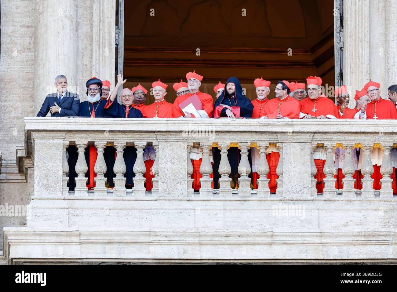 Cardinals react from a balcony of the St Peter's Basilica, as the new ...