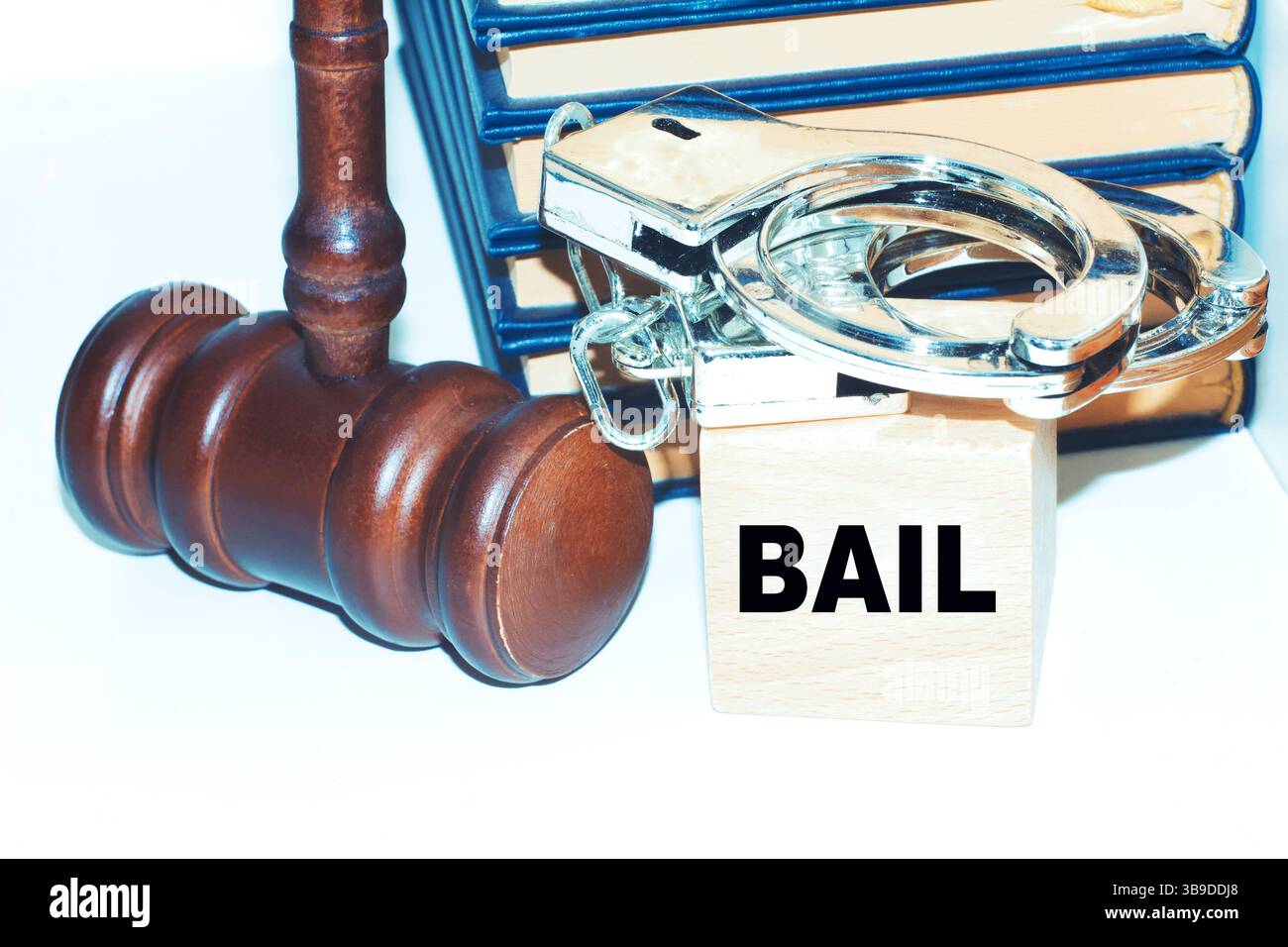 Bail message with handcuffs books and gavel Stock Photo - Alamy