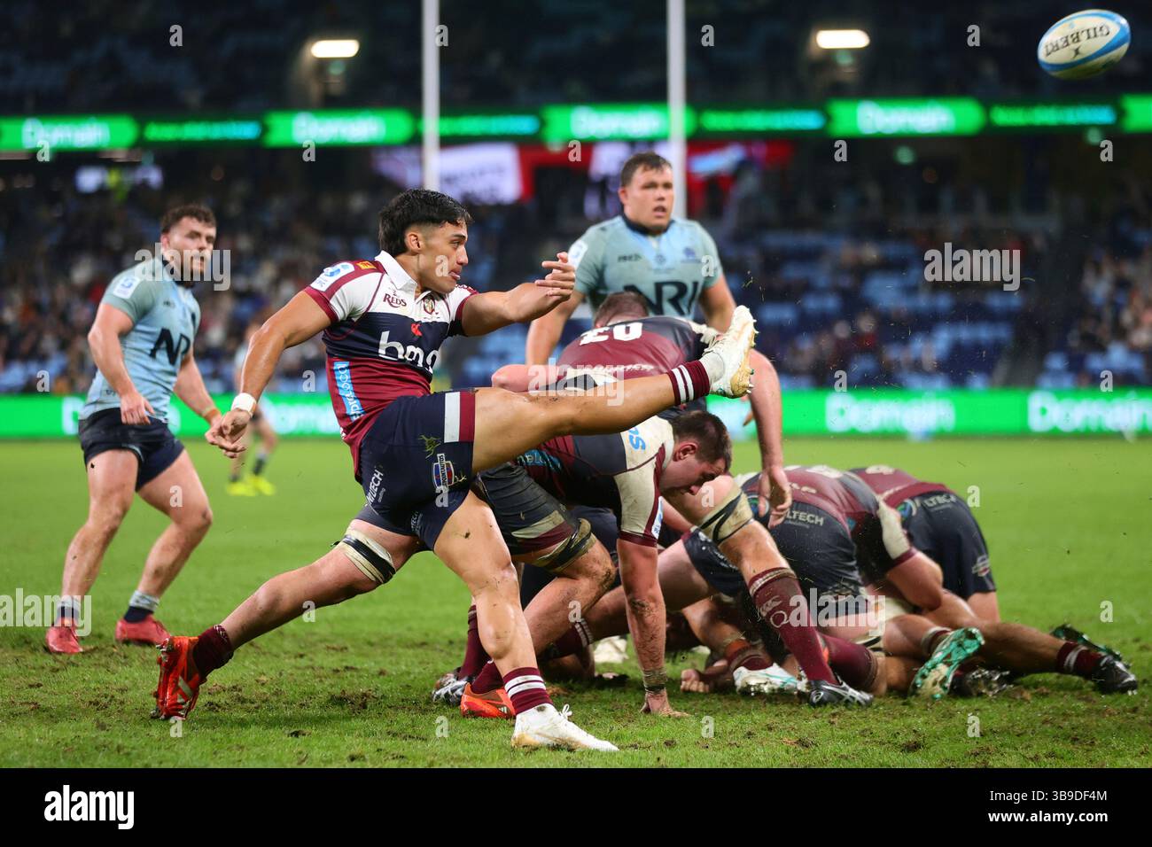 SYDNEY, AUSTRALIA - MAY 09: Kalani Thomas of Queensland Reds kicks the ...