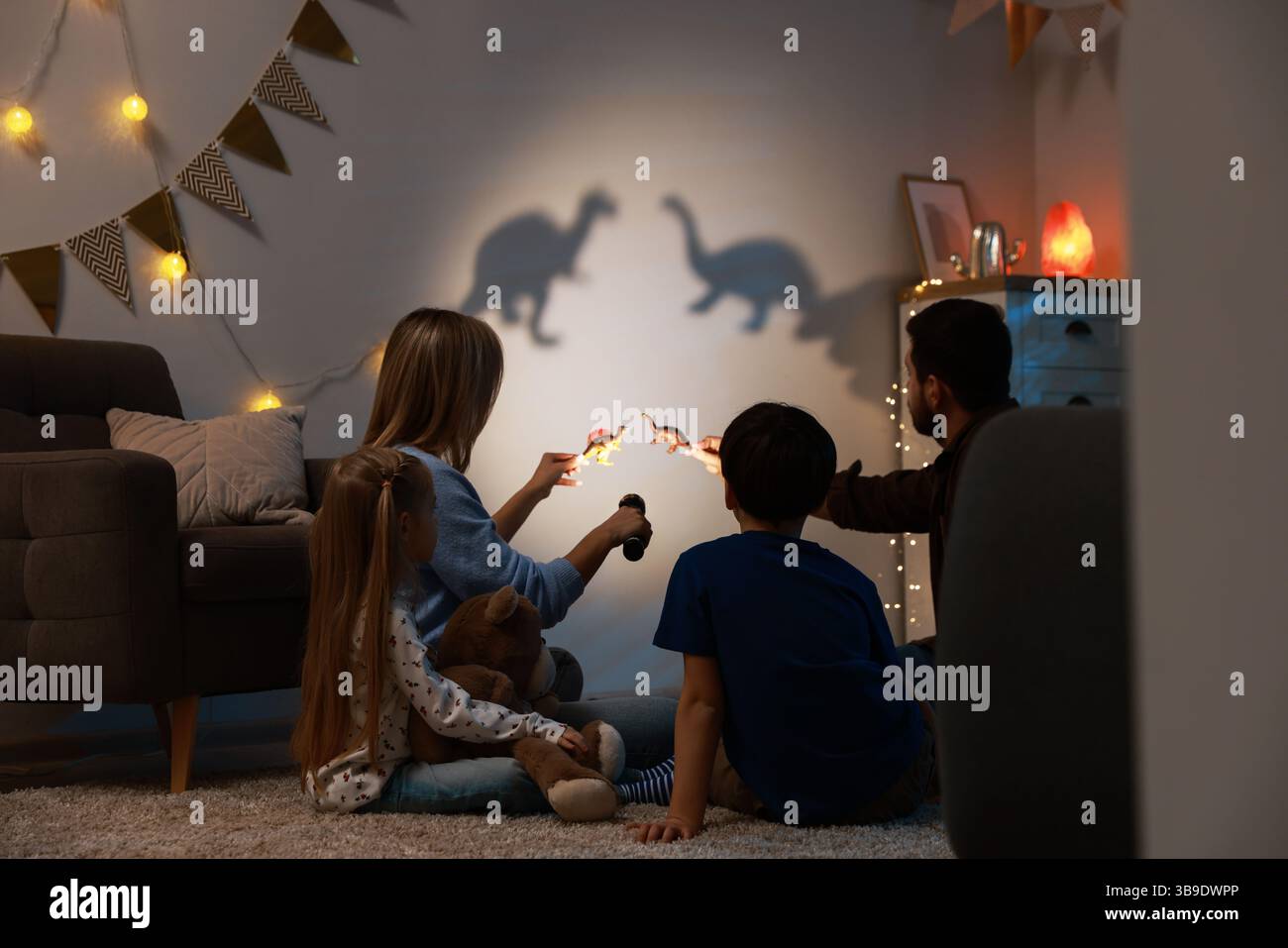 Child performing shadow play hi-res stock photography and images - Alamy