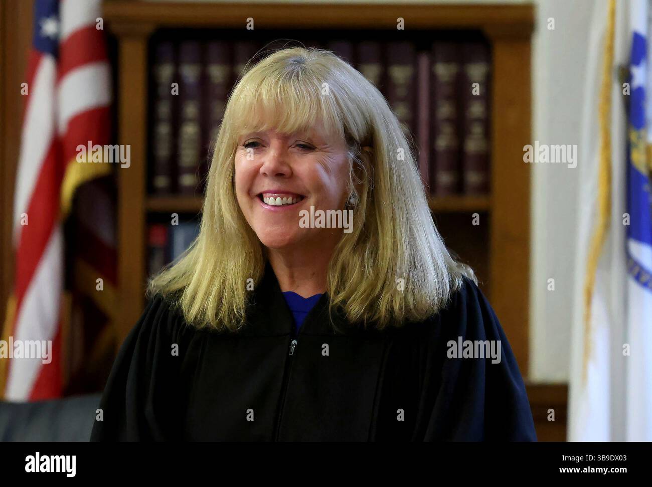 Judge Beverly Cannone speaks to jurors before the start of the Karen ...