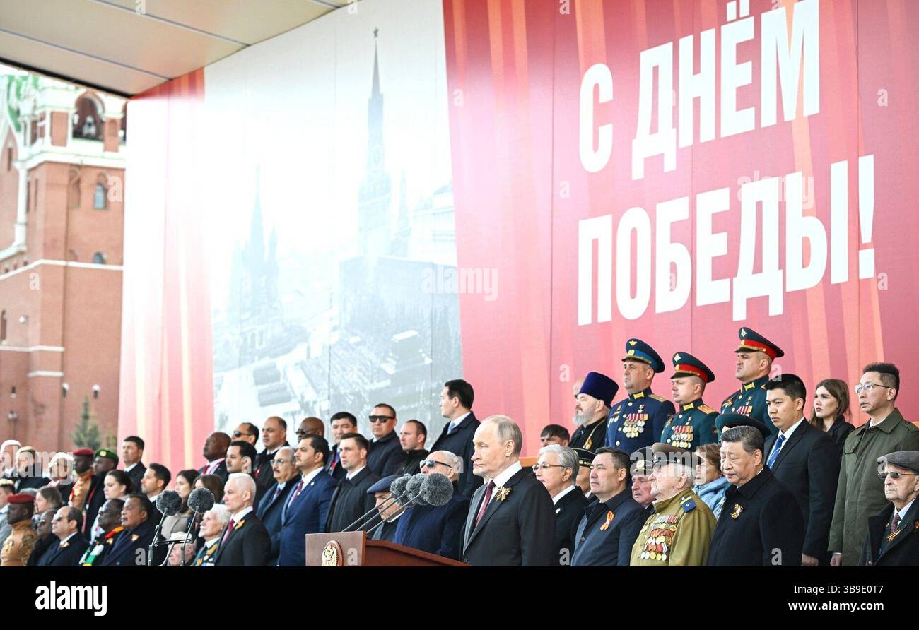 Vladimir Putin with honored guests. Military parade of the Russian Army ...