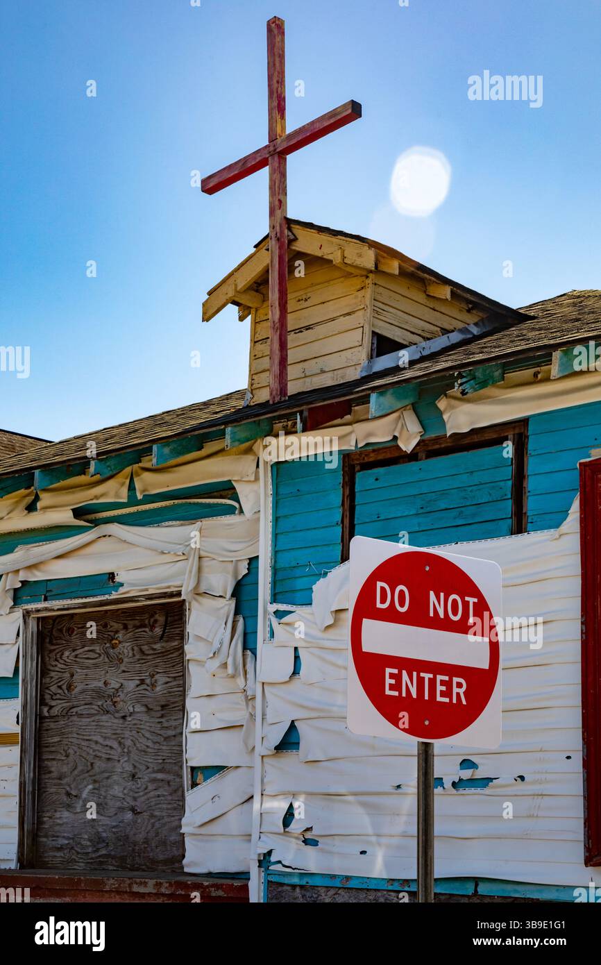 New Orleans, Louisiana - A 'Do Not Enter' sign sits below a cross at ...