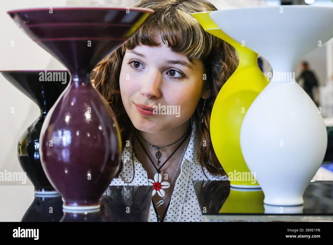 London, UK. 08th May, 2025. Staff member Ava with pieces by Anna ...