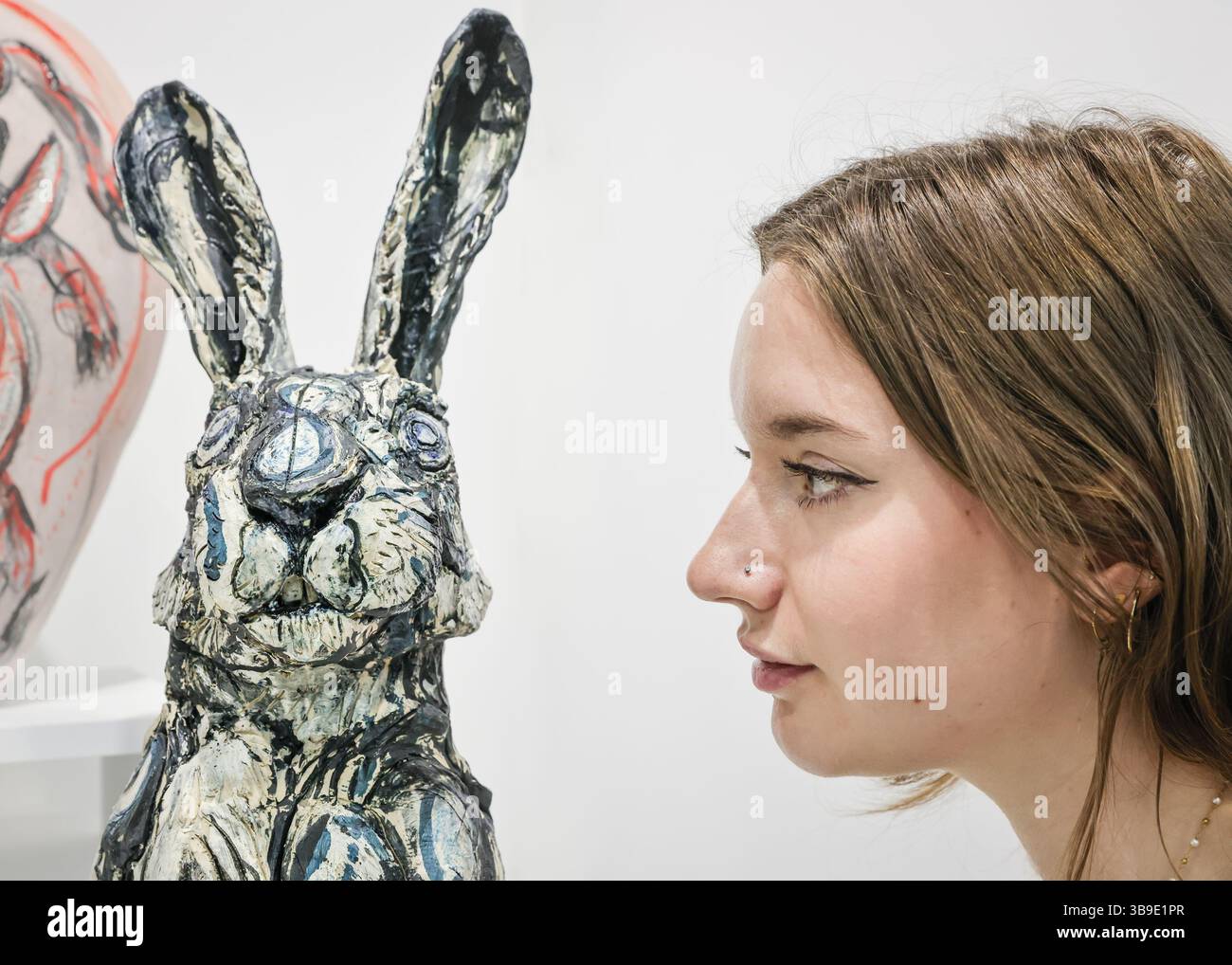 London, UK. 08th May, 2025. Staff member Jasmine with a rabbit ...
