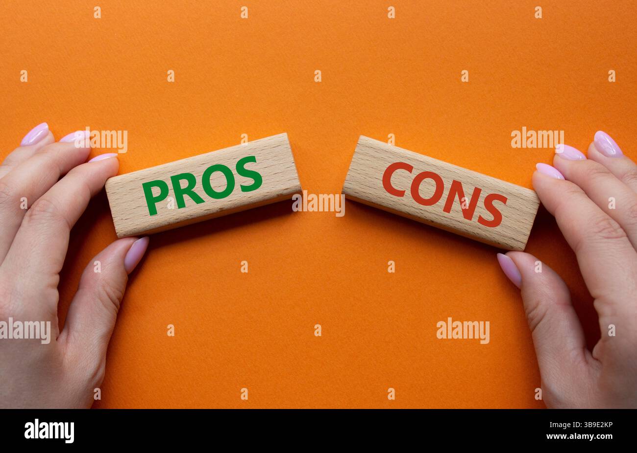 Pros vs Cons symbol. Concept word Pros vs Cons on wooden blocks ...