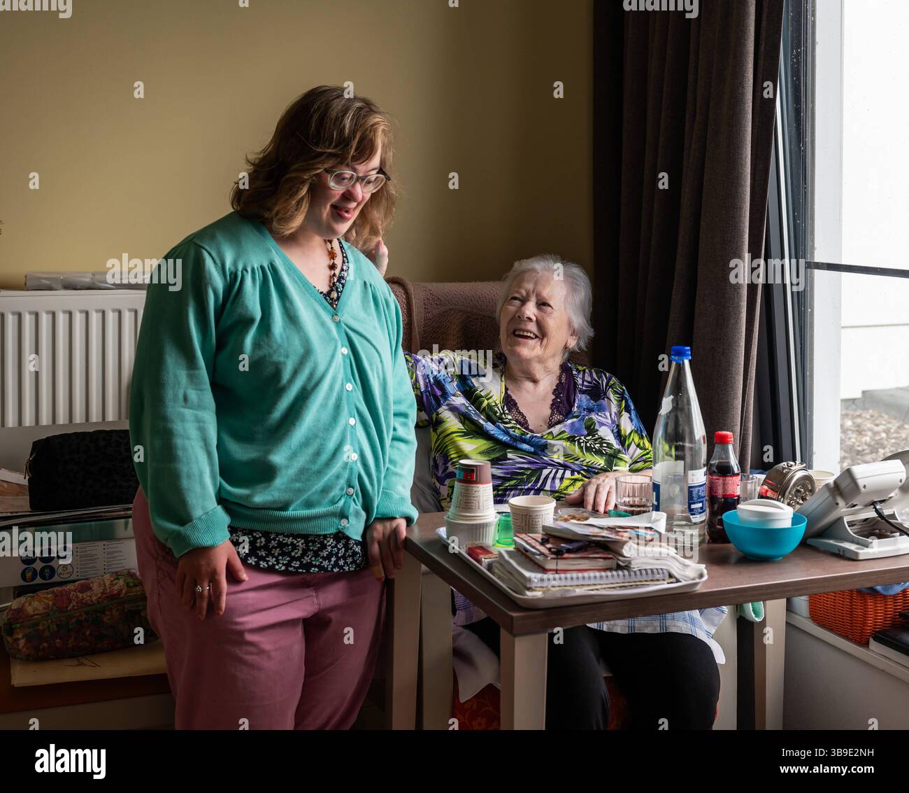 95 yo white grandmother greeting her 41 yo friend with Down Syndrome ...