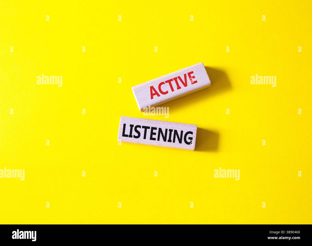 Active listening symbol. Wooden blocks with words Active listening ...