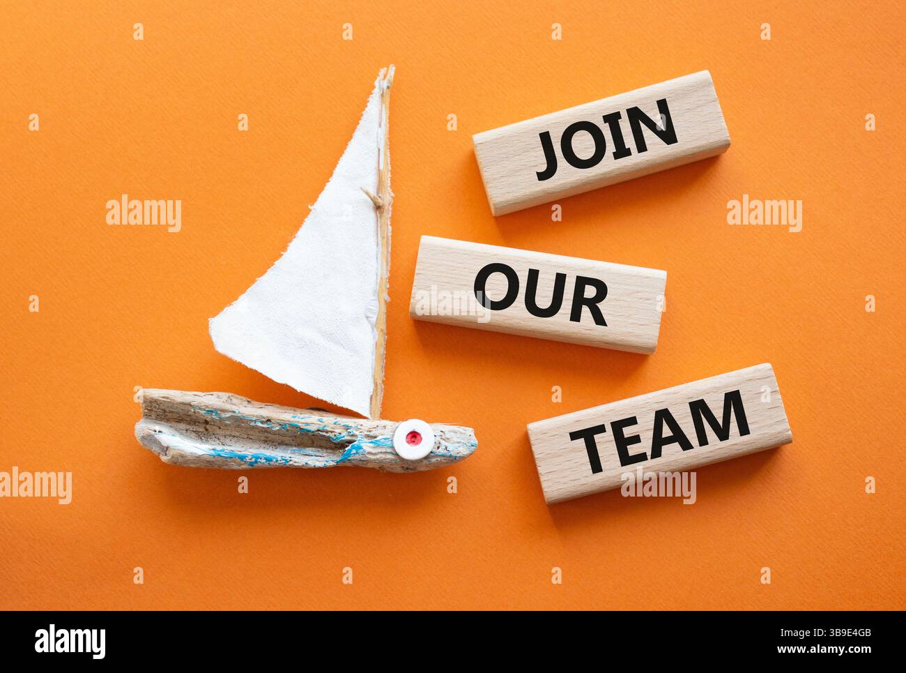 Join our team symbol. Wooden blocks with words Join our team. Beautiful ...
