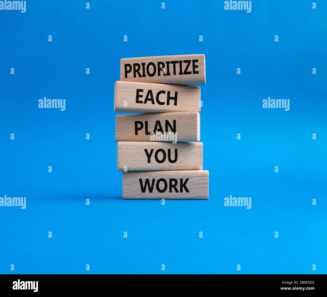 Priority, plan and work symbol. Wooden blocks with words Prioritize ...