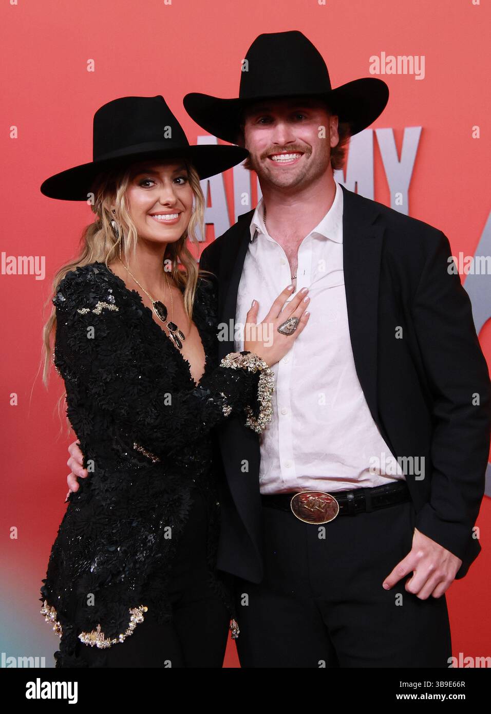 Lainey Wilson, Duck Devlin attend the 60th Academy of Country Music ...