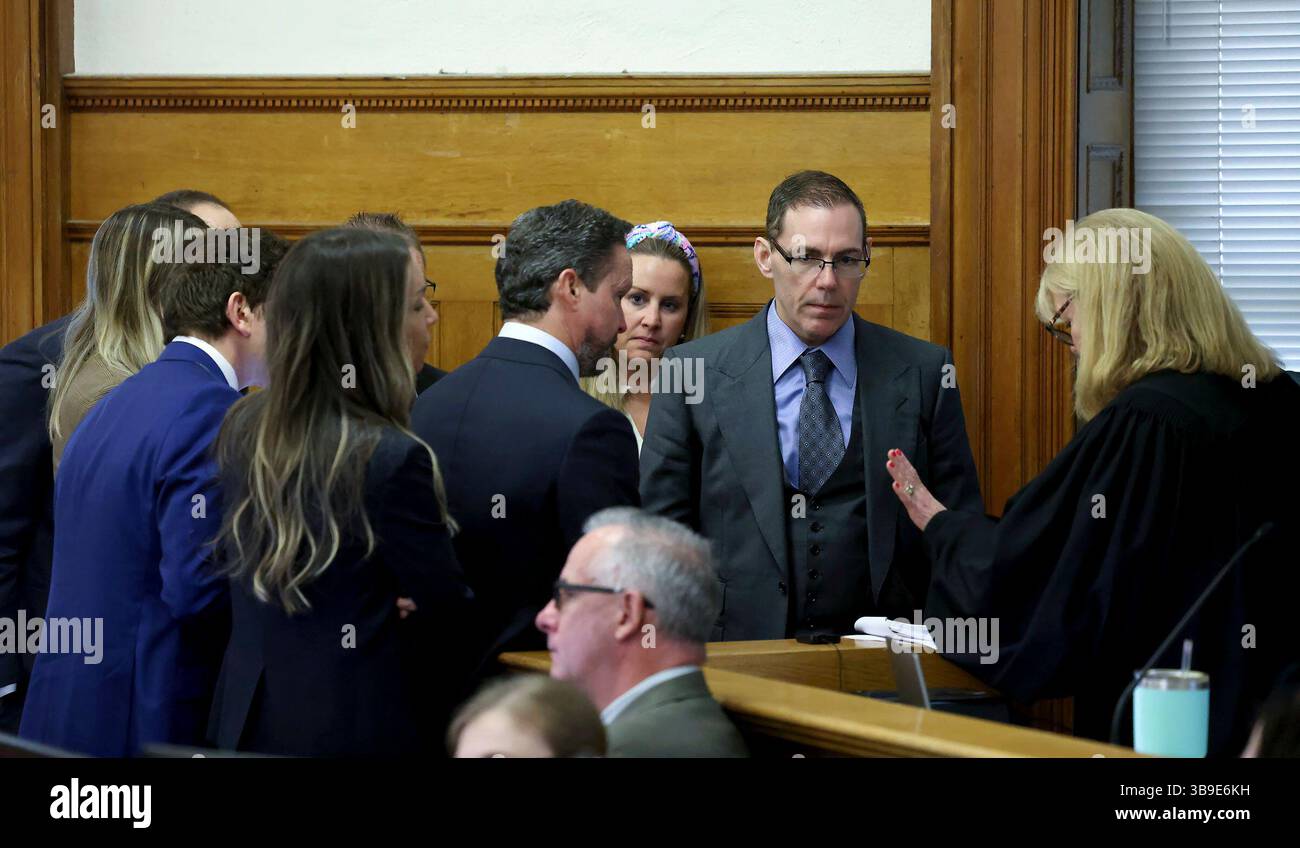 Court judge Beverly Cannone, right, confers with prosecutor Hank ...