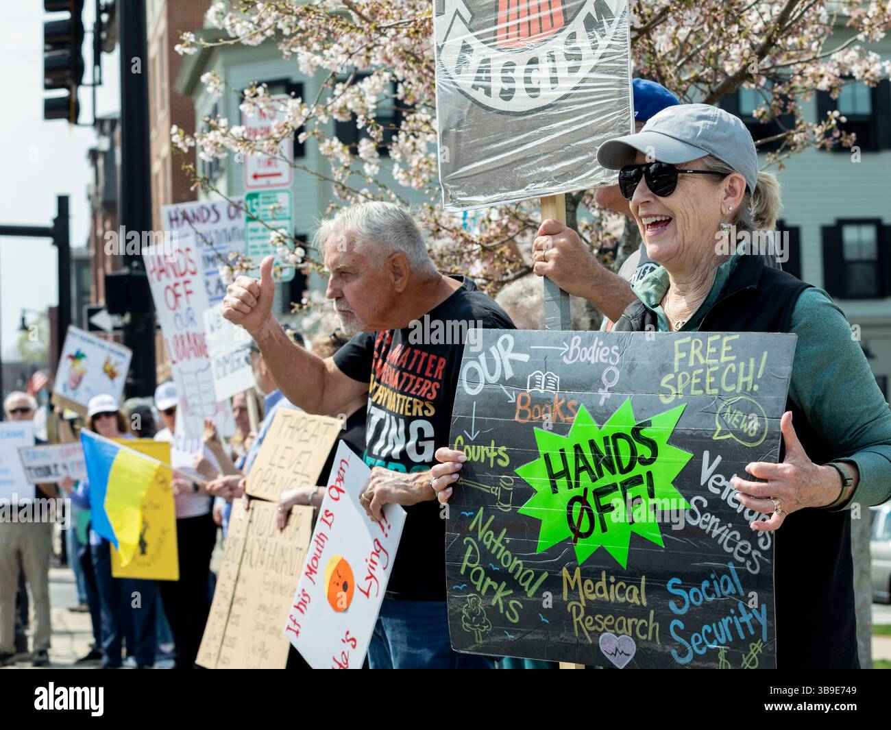 April 19, 2025. Beverly, MA. A crowd of citizens stood out in the Hands Off rally in downtown ...