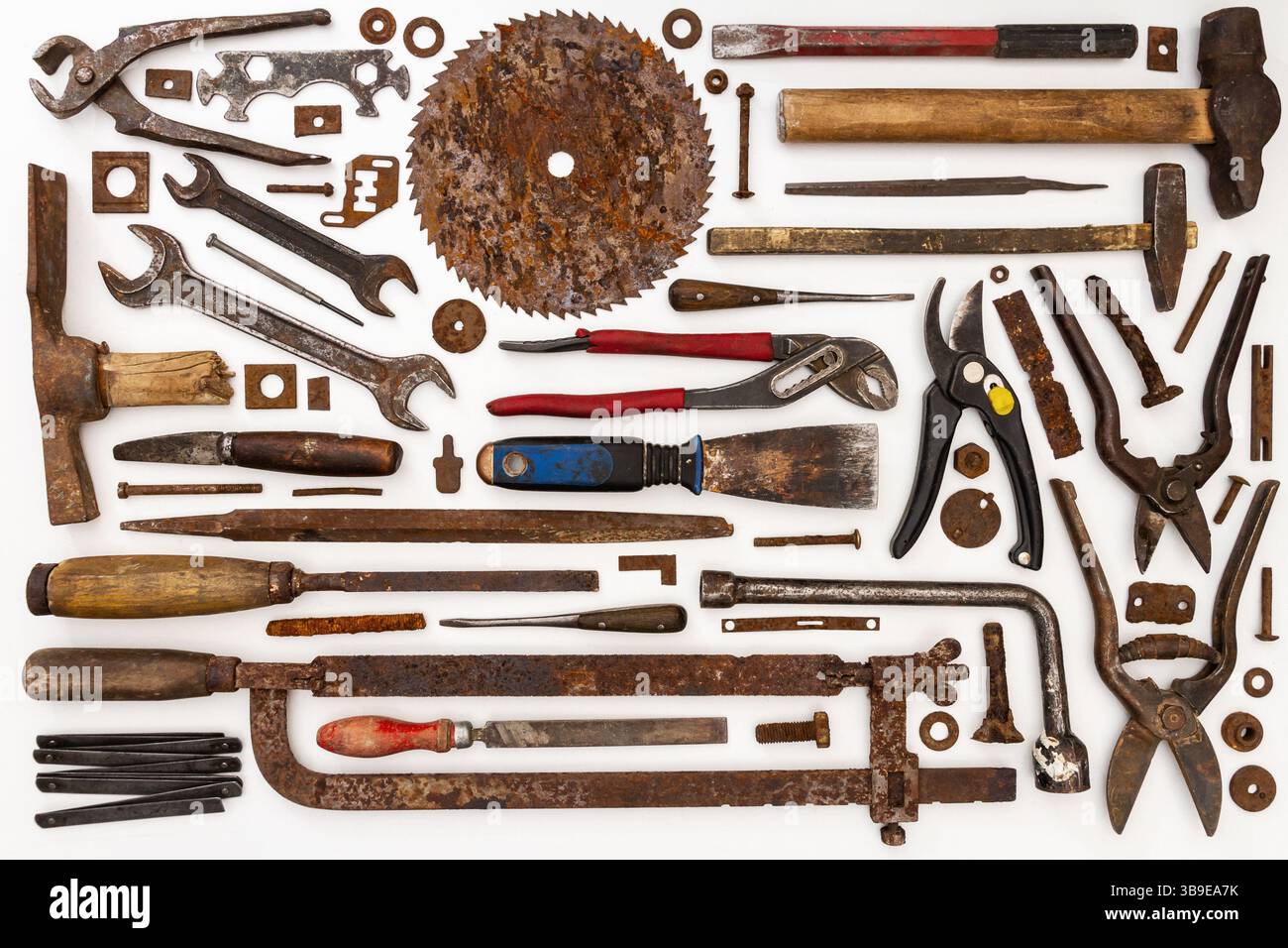 Flat lay of old hand tools on white background. Large collection of ...