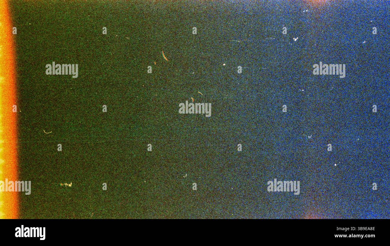 Blank grained film strip texture background with heavy grain, dust and ...