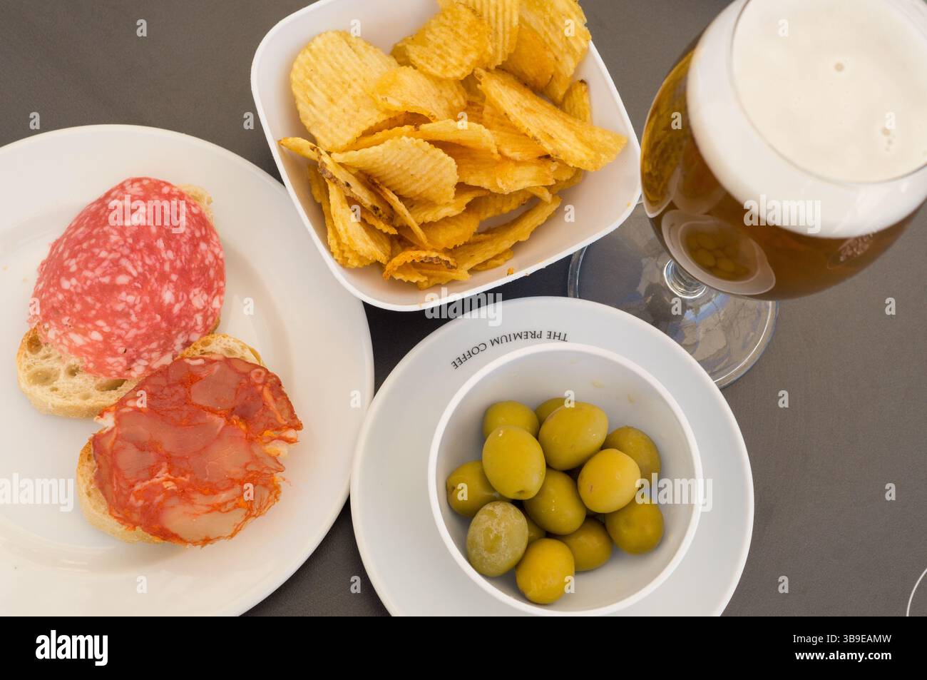 Photograph of typical Spanish snacks to enjoy with beer at a bar Stock ...