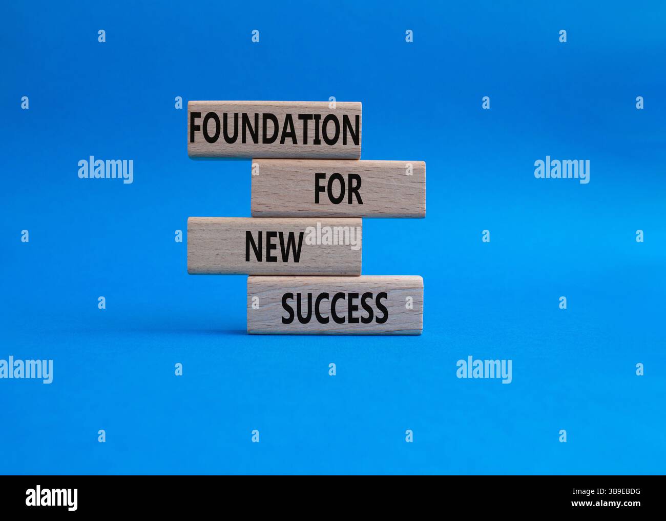Foundation for new success symbol. Wooden blocks with words Foundation ...