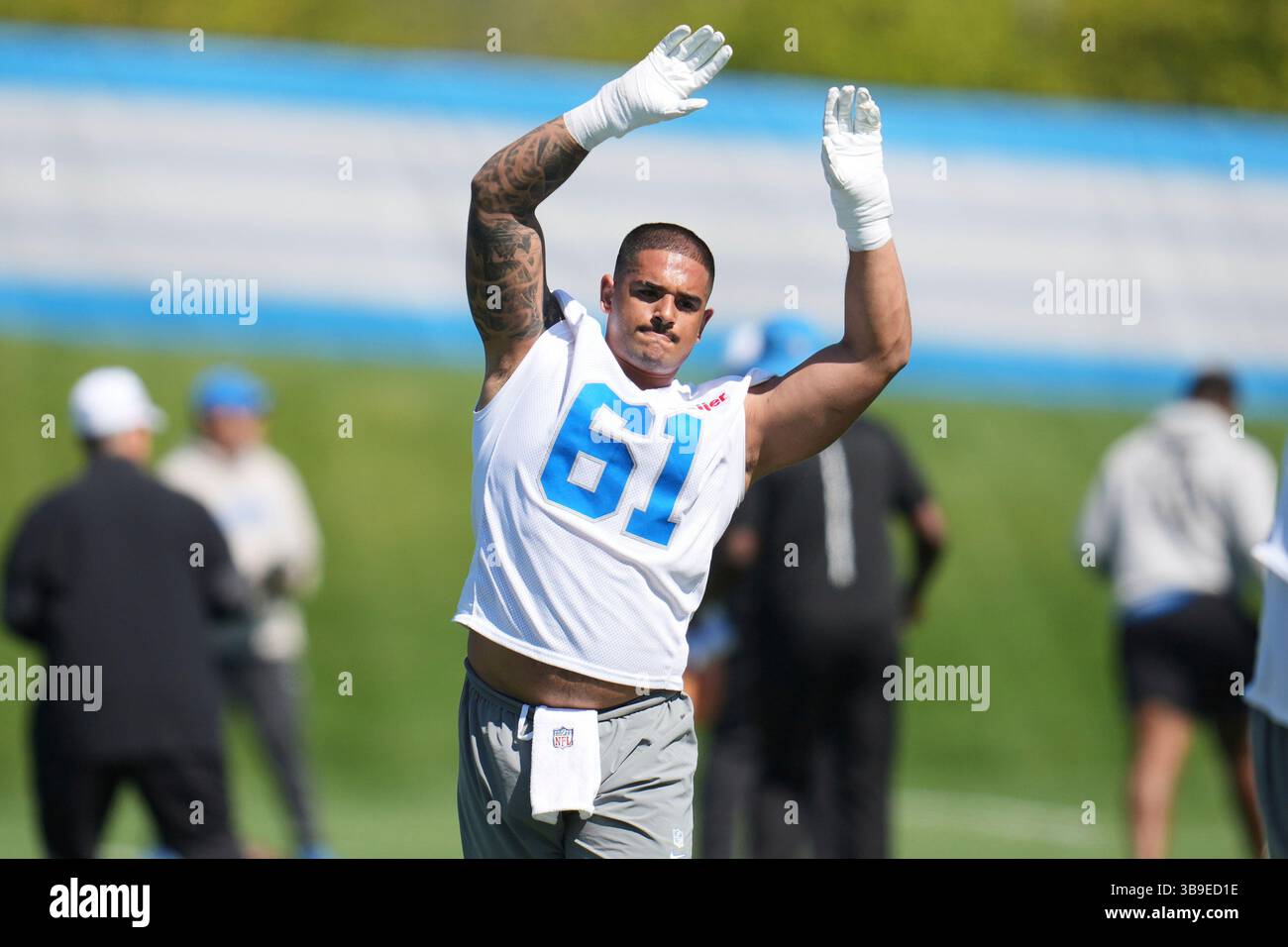 Detroit Lions defensive lineman Ahmed Hassanein (61) stretches during ...